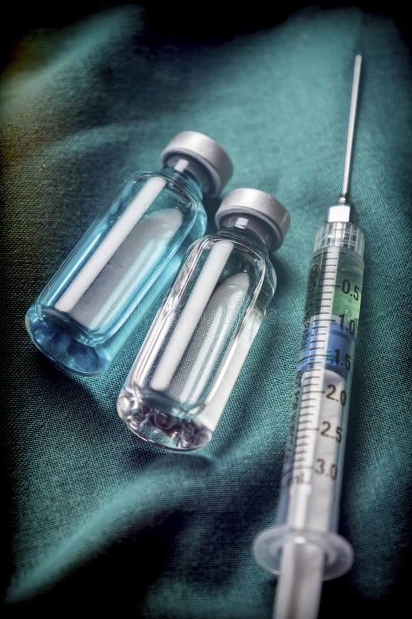 Some Vials and Syringe on Operating Table Stock Photo - Image of ...