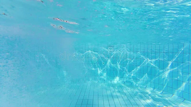 Someone Diving into Swimming Pool at the Background of Waves Texture ...