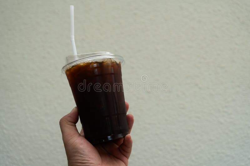 Someone Hand Holding a Cup of Iced Americano Stock Photo - Image of ...