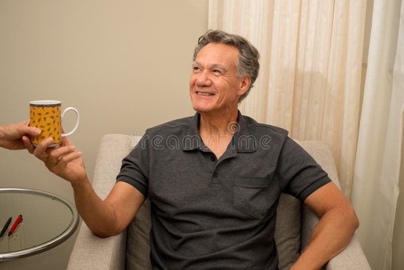 Someone Hands a Man a Cup of Coffee Stock Photo - Image of hand, person ...