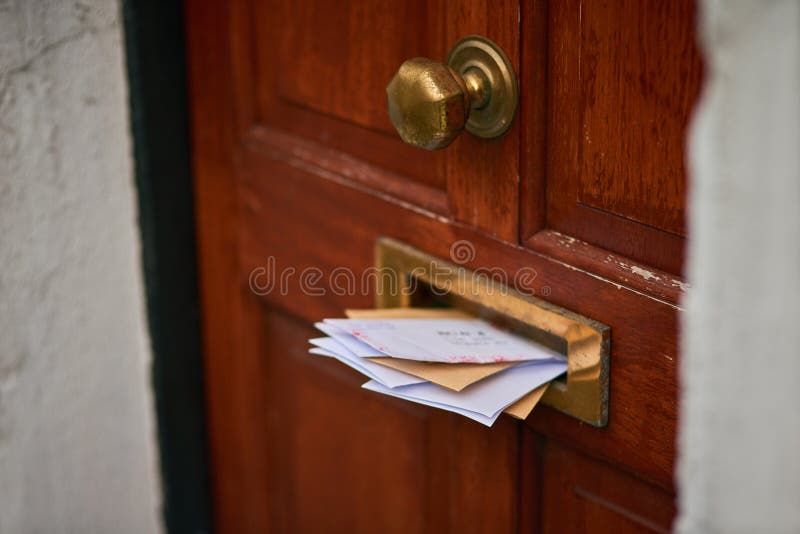 Someone Hasnt Checked Their Mail in a while. Letters in a Letter Box ...