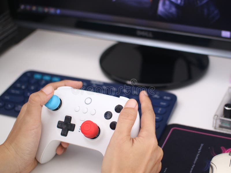 Someone is Holding Game Controller. Stock Image - Image of bokeh ...