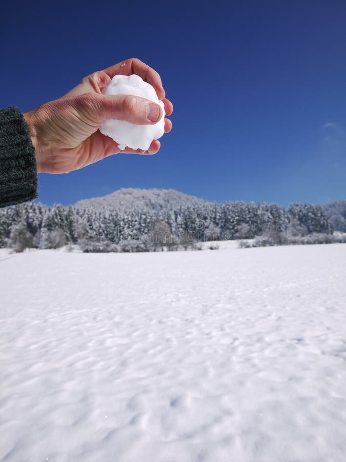 Snowball in hand stock photo. Image of cloth, palm, fluffy - 104047886