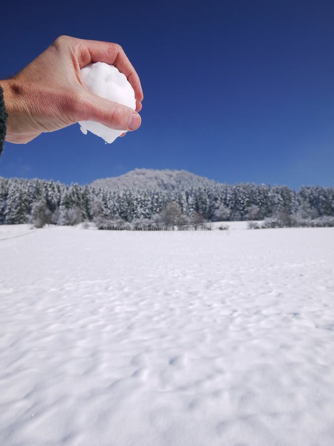 Snowball in hand stock photo. Image of cloth, palm, fluffy - 104047886
