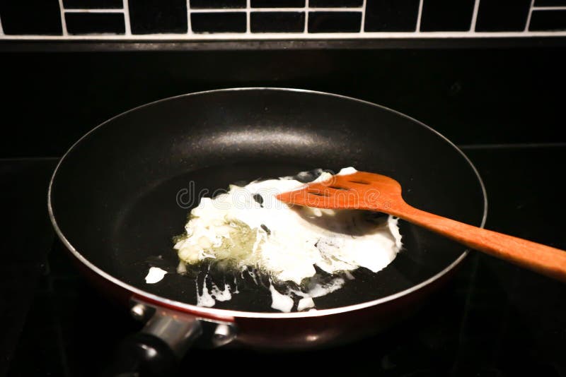 Making white cream sauce stock image. Image of whipping - 107179463