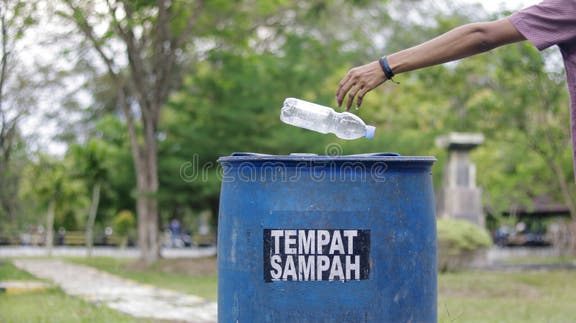 Someone is Throwing Garbage in the Trash Stock Image - Image of trash ...