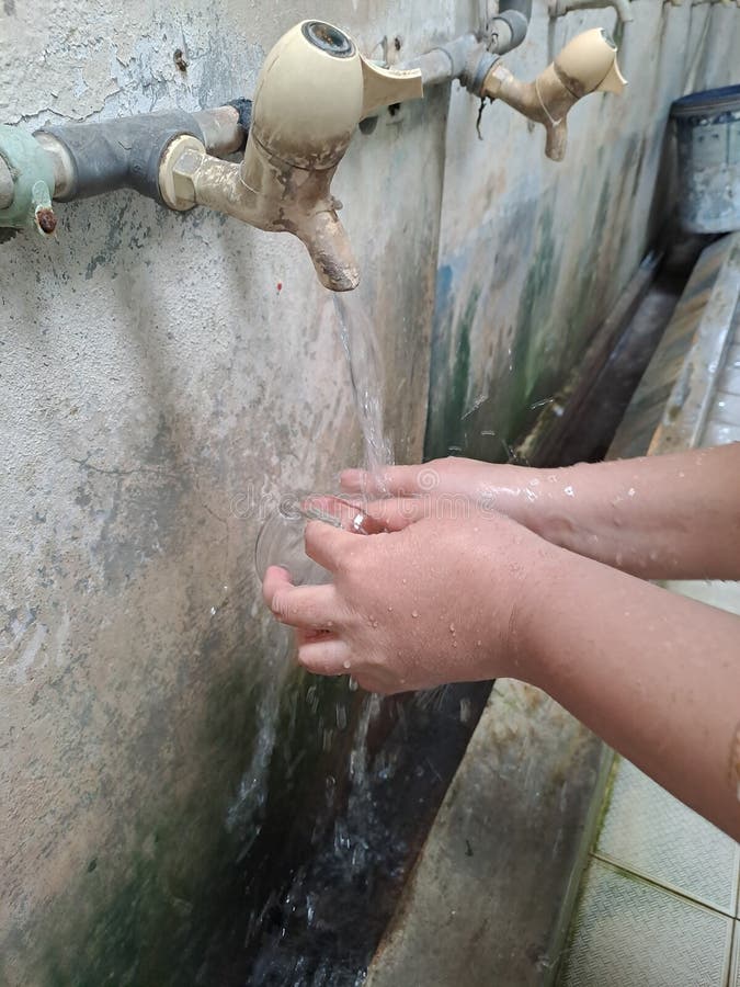 Someone is Washing a Glass in Running Water Stock Photo - Image of ...