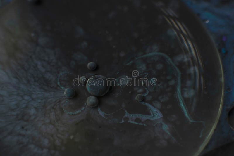 Something Strange in Dark Fluid Substance Stock Photo - Image of ...