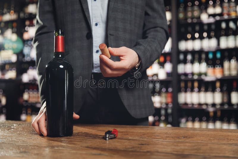 Sommelier Man Sniffing Cork of Red Wine Bottle Corkscrew Stock Photo ...