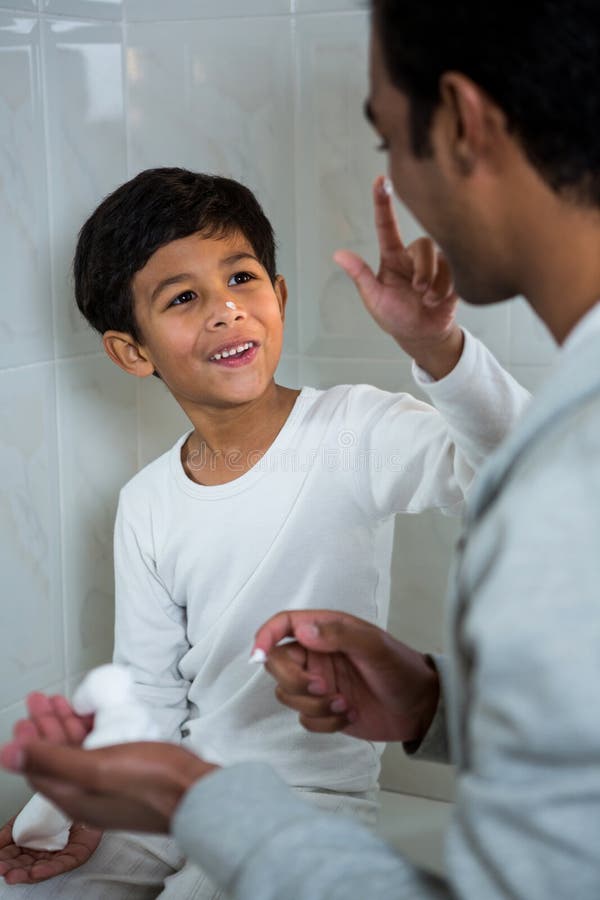 Son Applying Foam on Fathers Face Stock Photo - Image of cheerful ...