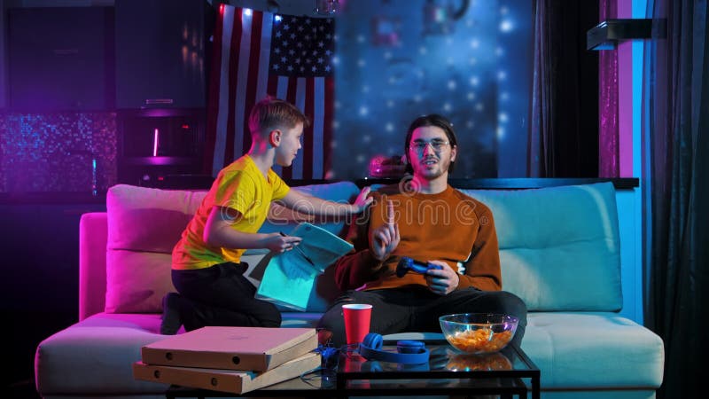 Son Asks Father for Help with His Homework. Stock Footage - Video of ...