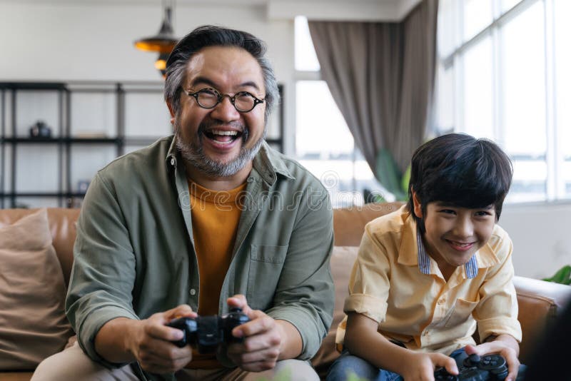 Son and Dad Playing Video .game at Home Stock Photo - Image of person ...