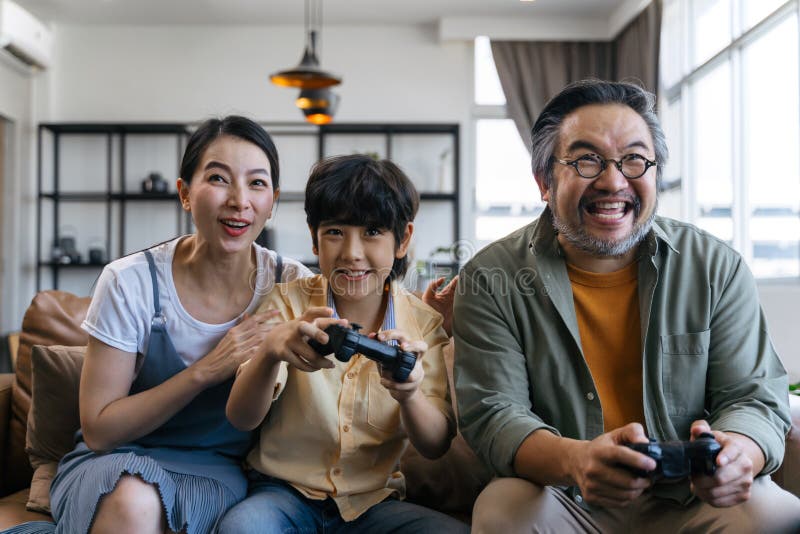 Son and Dad Playing Video Game at Home. Stock Image - Image of father ...