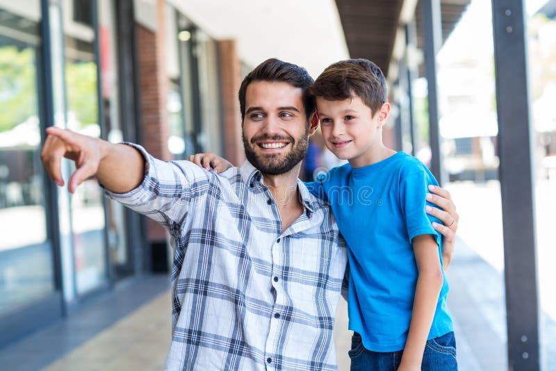 Son and father look away stock image. Image of affection - 56805475