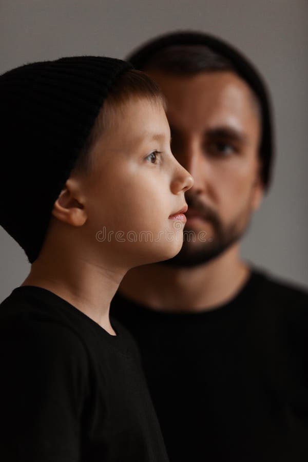 Son and his fathers faces stock photo. Image of fooling - 260730598