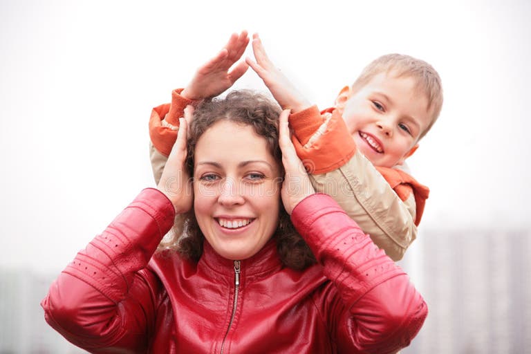 Son and Mother Show House from Hands Stock Photo - Image of ...