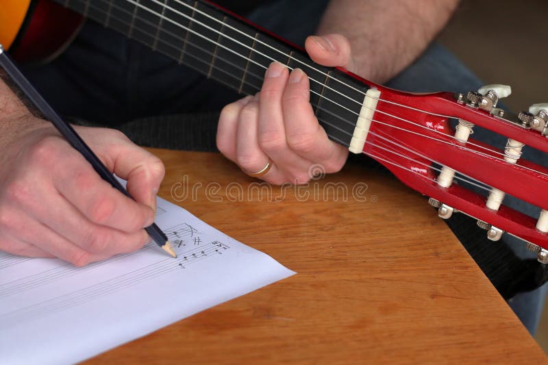 Songwriter Composing a Song for Guitar Stock Image - Image of ...