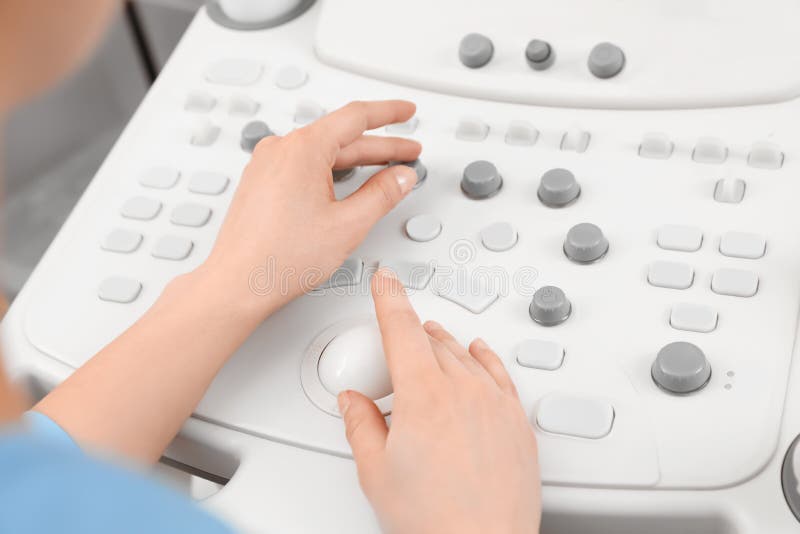 Sonographer Operating Modern Ultrasound Machine in Clinic Stock Image ...