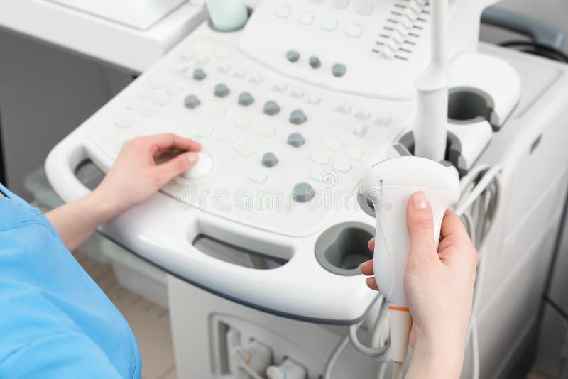 Sonographer Operating Modern Ultrasound Machine in Clinic Stock Image ...