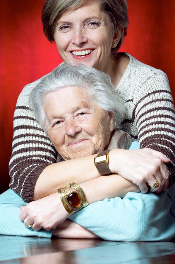 Sonrisa De La Madre Y De La Hija Foto de archivo - Imagen de risa, deslumbrante: 2479024