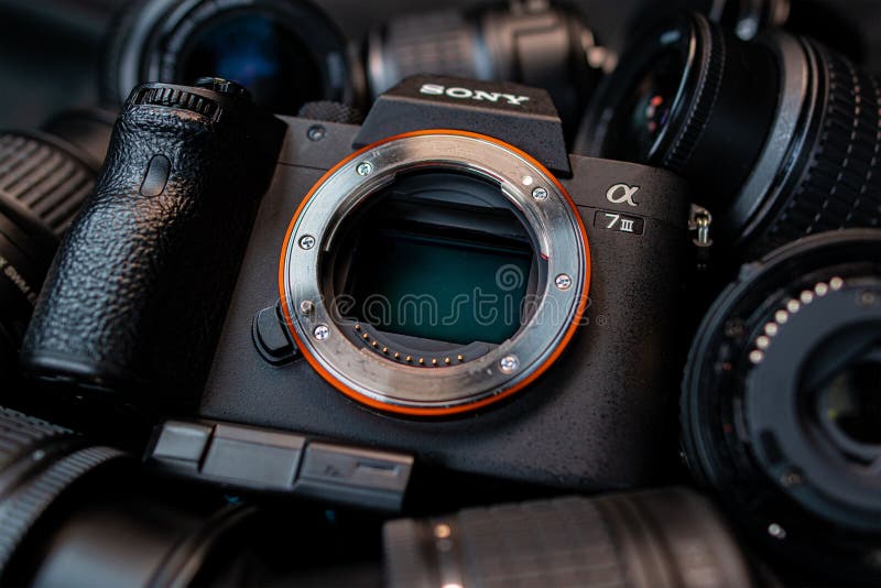 Sony A7III in a Bunch of Camera Lenses Editorial Photo - Image of ...