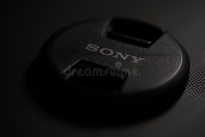 Sony Lens Cap Isolated with Black Surface Editorial Photography - Image ...