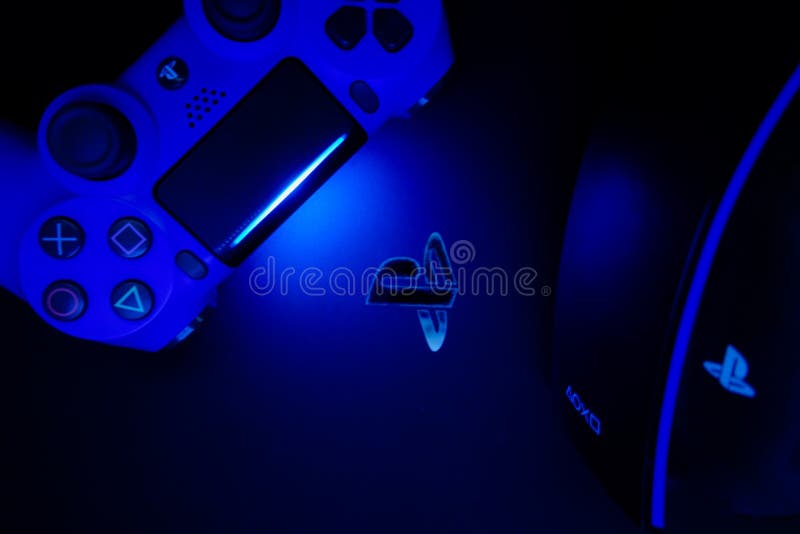 Sony Playstation Logo Illuminated on Blue Light from Game Controller ...