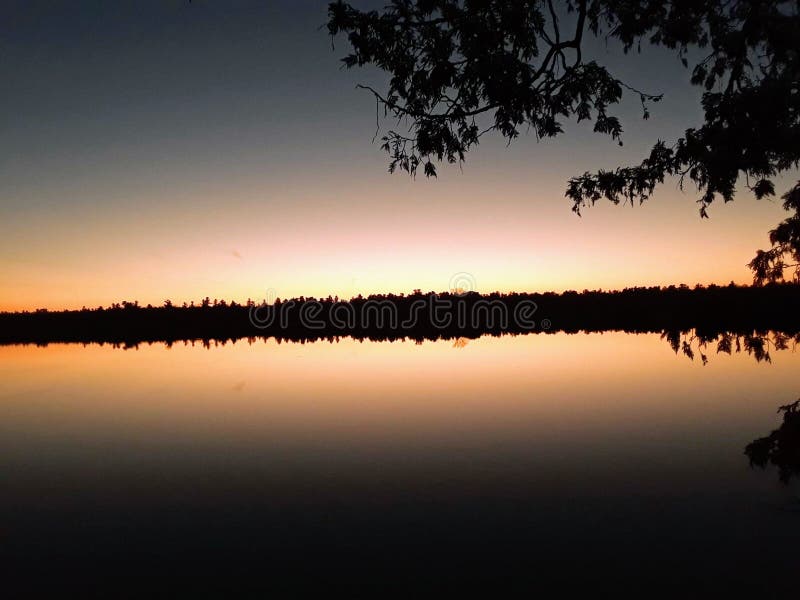 Soothing Lake Sunset stock photo. Image of night, cloud - 260687604