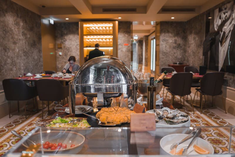 Luxurious Dining Area with Elegant Decor and Buffet in High-End Hotel ...