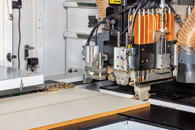 Advanced Woodworking Machine Crafting Intricate Designs in a Modern ...