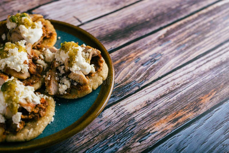Sopitos, Typical Mexican Dish on Wooden Table. Sopes, Stock Image ...