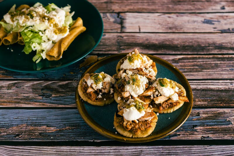 Sopitos, Typical Mexican Dish on Wooden Table. Stock Image - Image of ...