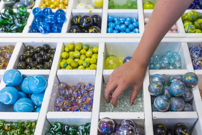 Hand Full Marbles Stock Photos - Free & Royalty-Free Stock Photos from ...