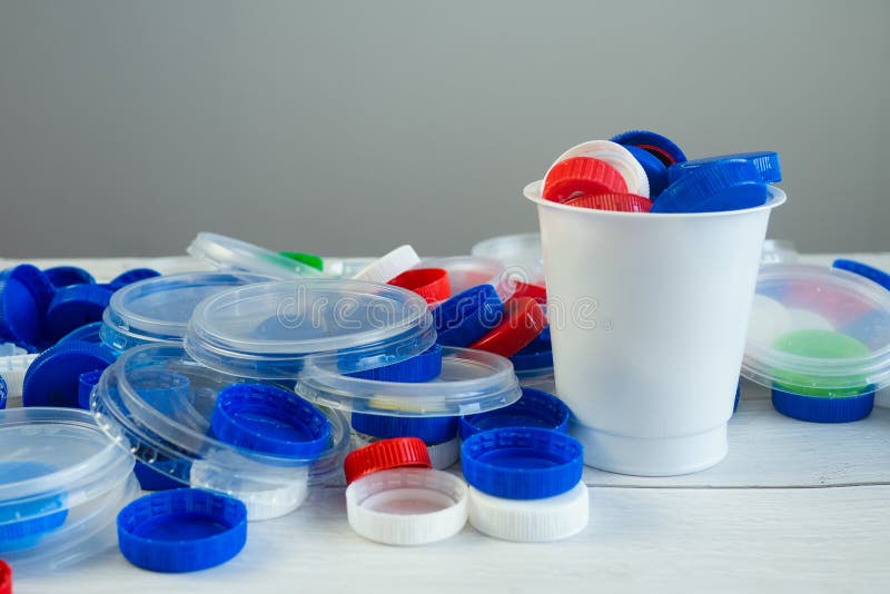 Sorting Household Colored Plastic Bottle Caps and Lids. Zero Waste and ...