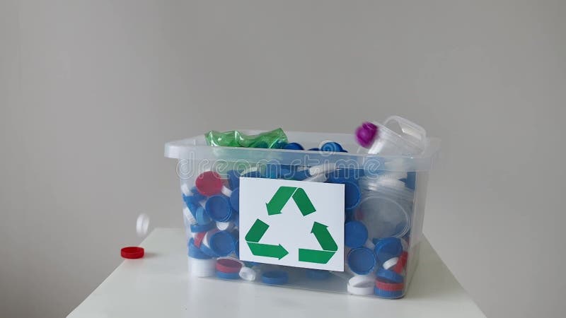 Man Sorting Plastic Drink Bottle Caps and Lids Recyclable Materials for ...