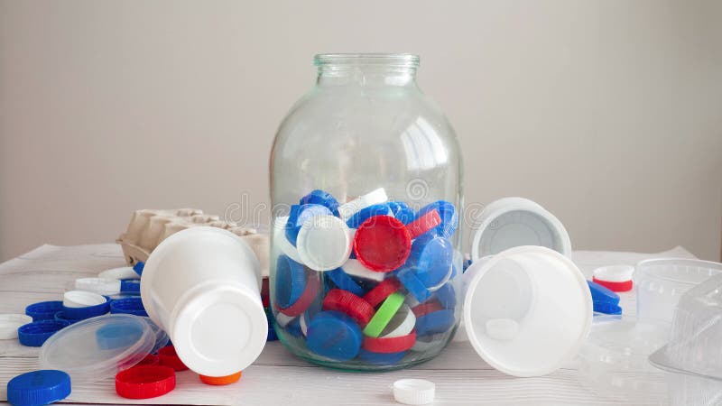 Man Sorting Plastic Drink Bottle Caps and Lids Recyclable Materials for ...