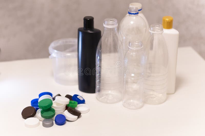 Sorting Plastic Waste at Home. Plastic Transparent Bottles are Selected ...