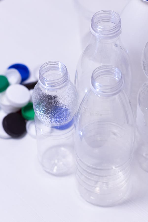 Sorting Plastic Waste at Home. Plastic Transparent Bottles are Selected ...