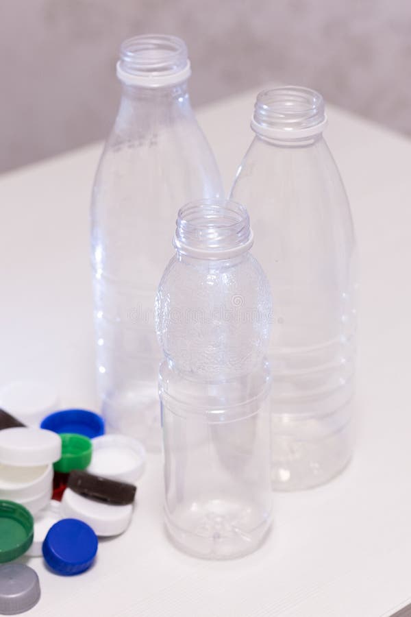 Sorting Plastic Waste at Home. Plastic Transparent Bottles are Selected ...