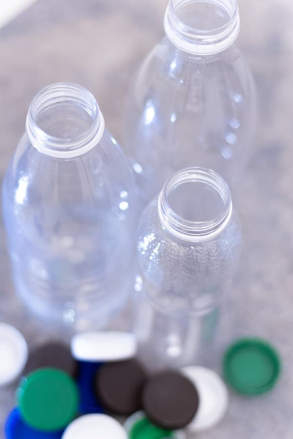 Sorting Plastic Waste at Home. Plastic Transparent Bottles are Selected ...