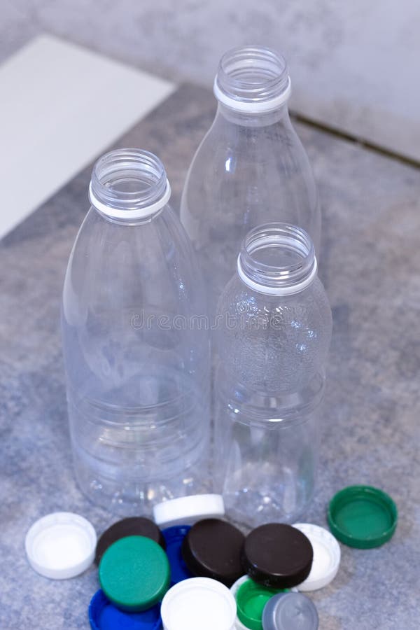 Sorting Plastic Waste at Home. Plastic Transparent Bottles are Selected ...
