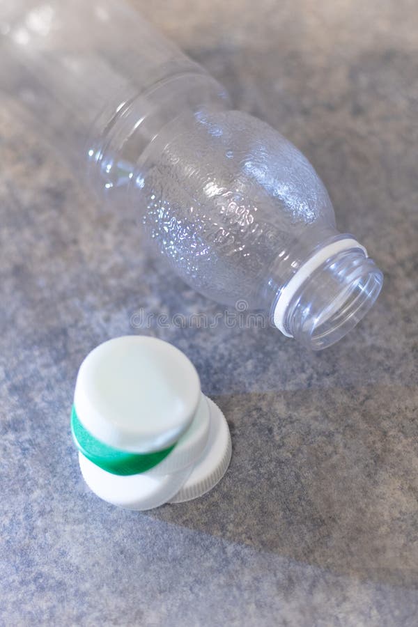 Sorting Plastic Waste at Home. Plastic Transparent Bottles are Selected ...