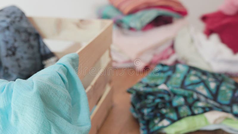 Sorting Used Cloths into Piles Stock Footage - Video of messy, domestic ...
