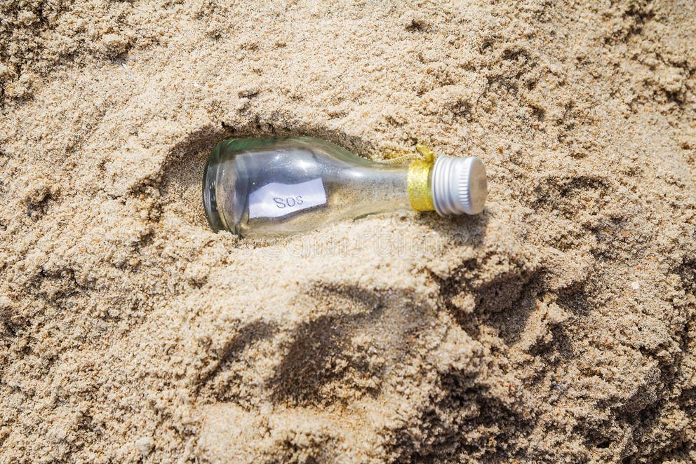 SOS Message in Glass Bottle Stock Photo - Image of beach, outdoors ...