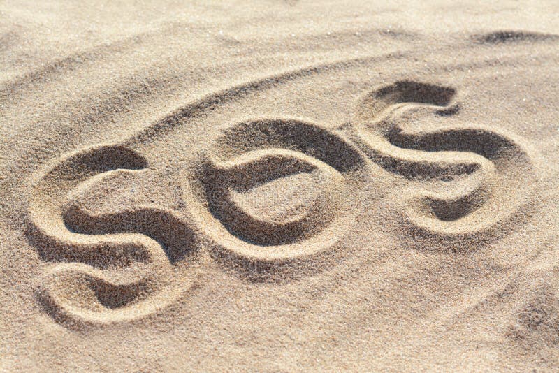 SOS Message Written on Sandy Beach Outdoors Stock Photo - Image of ...