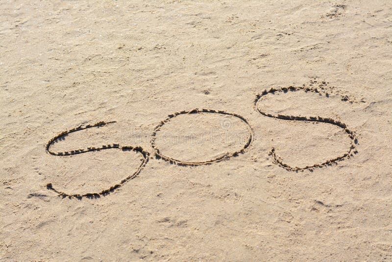 SOS Message Written on Sandy Beach Outdoors Stock Image - Image of ...