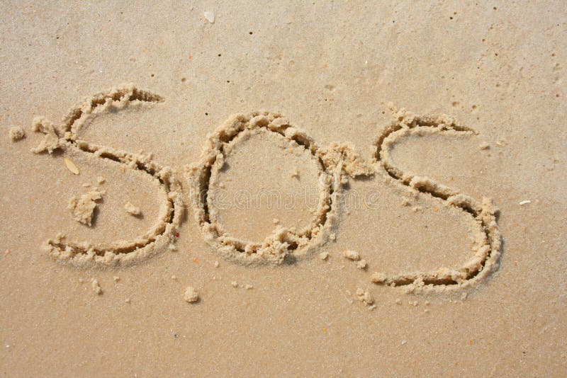 SOS in the sand stock photo. Image of easy, written, spelled - 1037024