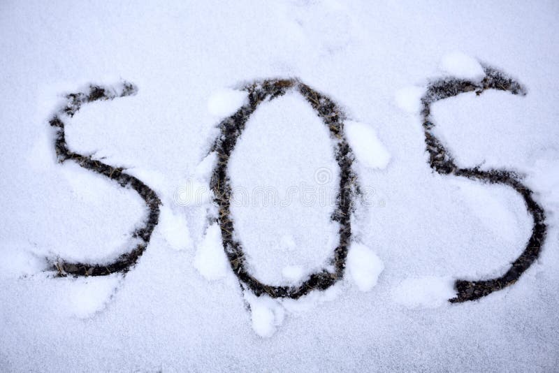 SOS Sign for Help Needed Written in the Snow Stock Image - Image of ...