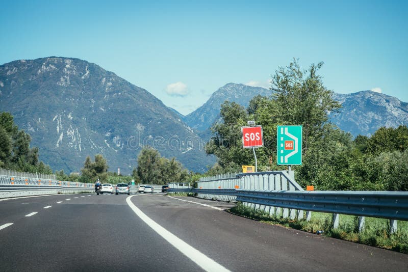 SOS Sign on the Highway, Emergency Lane Stock Photo - Image of sign ...