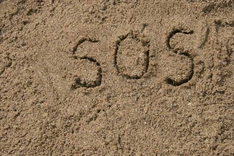 SOS writing on sand stock photo. Image of beaches, writing - 698632